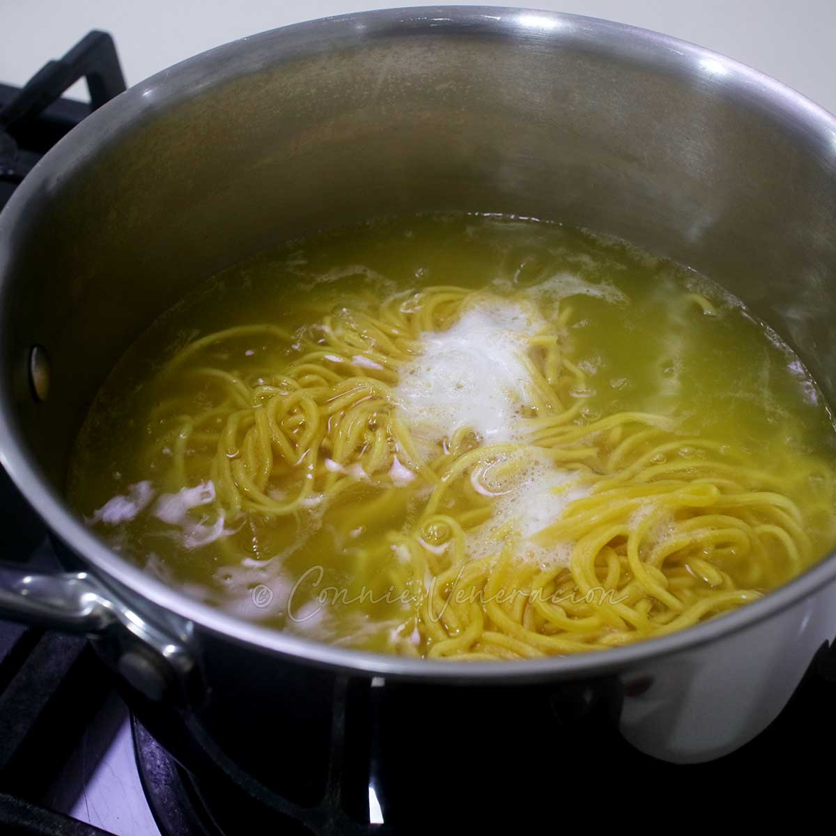 Stir fried noodles, Chinese sausage and bok choy