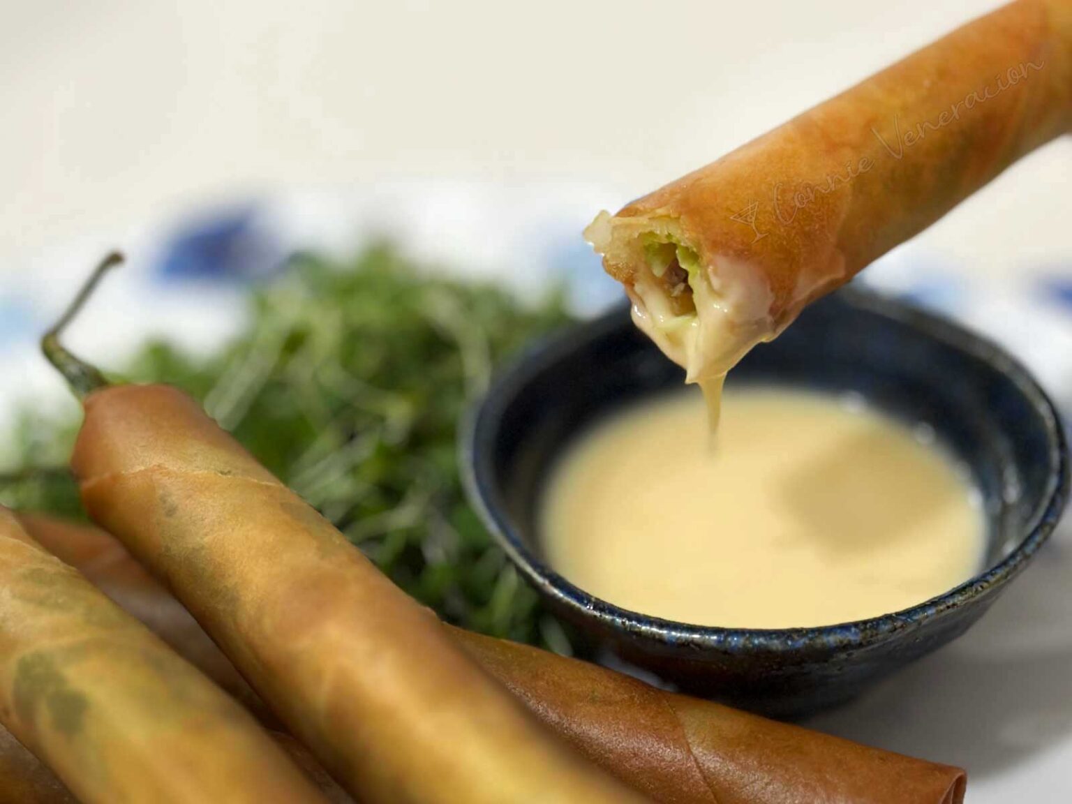 Roast duck, chili and cheese spring rolls