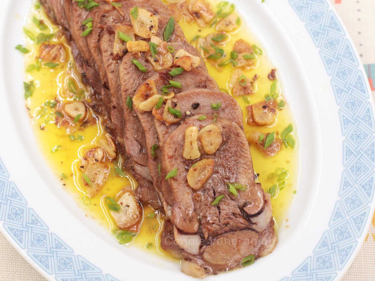 Lengua al ajillo (Spanish-style beef tongue with garlic)